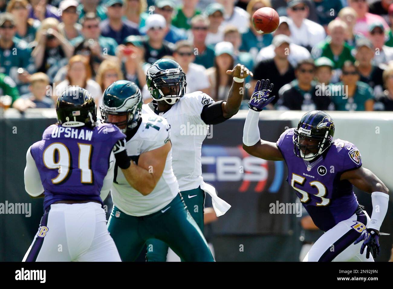 Philadelphia Eagles' Michael Vick passes as Baltimore Ravens' Jameel ...