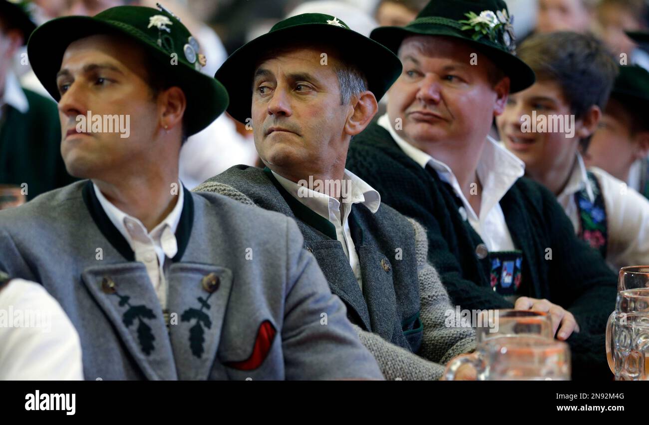 Spectators watch the German Finger Wrestling championships in Warngau ...
