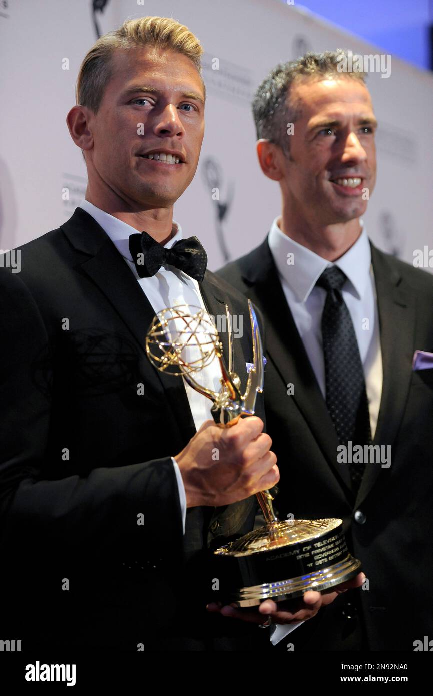 Dan Savage, right, and Terry Miller pose backstage with the Governors ...