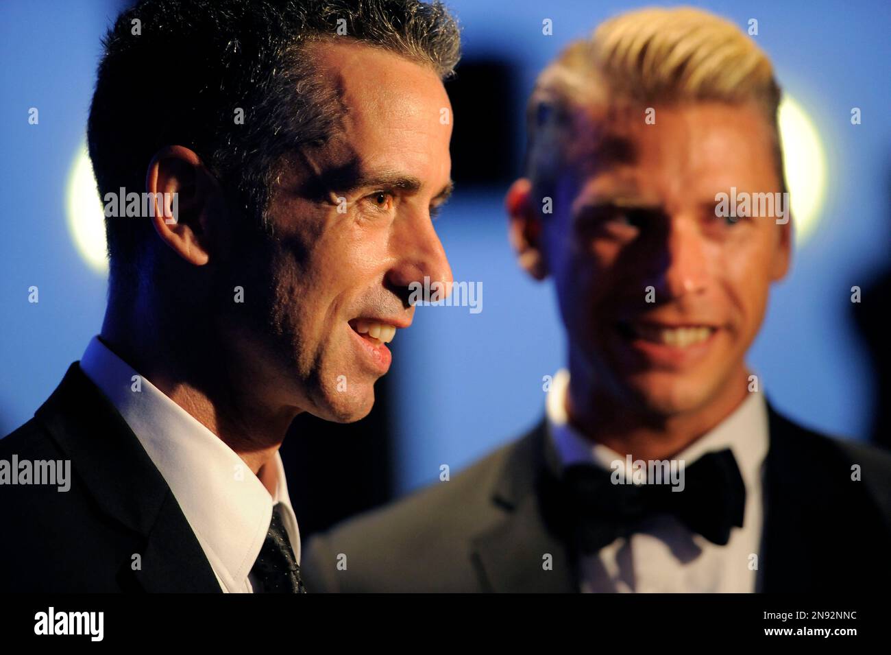 Dan Savage, left, and Terry Miller pose backstage with the Governors ...