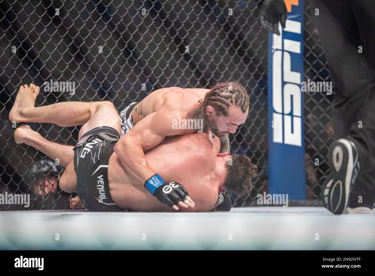 PERTH, AUSTRALIA - FEBRUARY 12: Blake Bilder (top) controls the body of ...