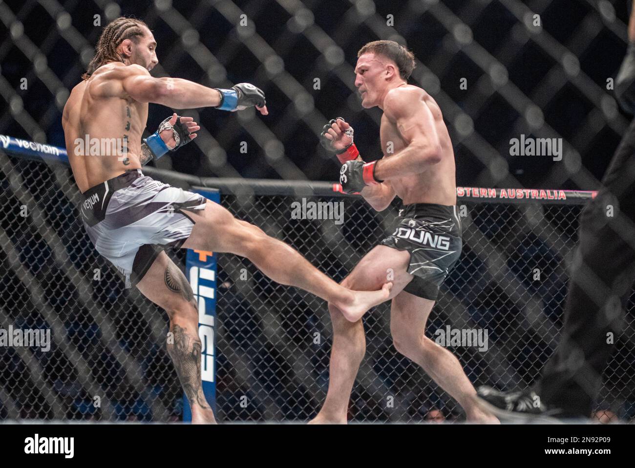 PERTH, AUSTRALIA - FEBRUARY 12: (L-R) Blake Bilder kicks Shane Young in ...
