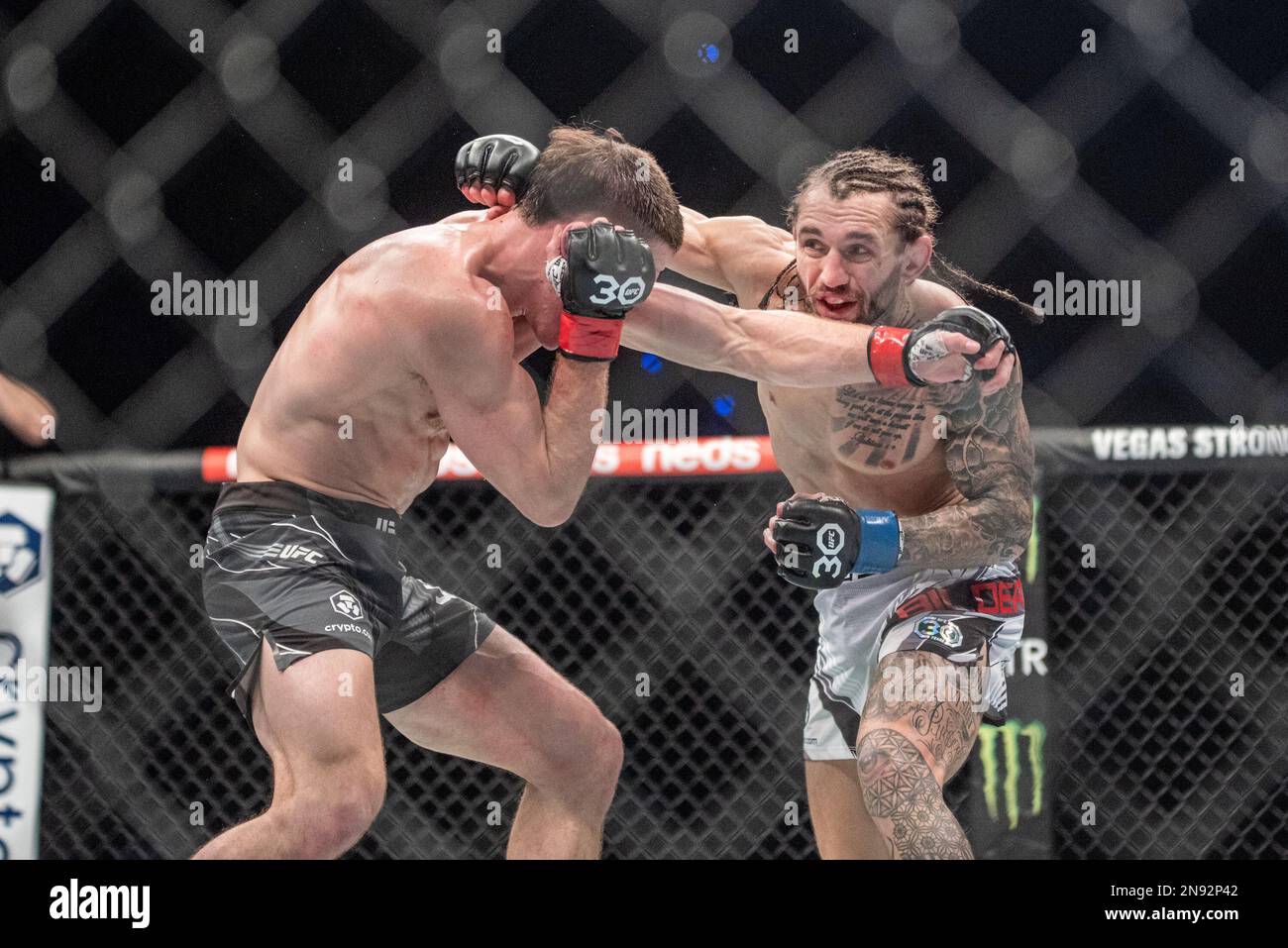 PERTH, AUSTRALIA - FEBRUARY 12: (R-L) Blake Bilder punches Shane Young ...