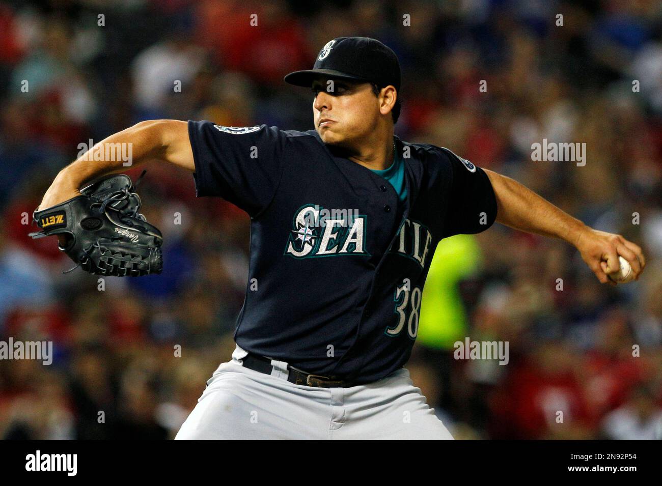 Seattle Mariners starting pitcher Jason Vargas (38) winds up to deliver ...