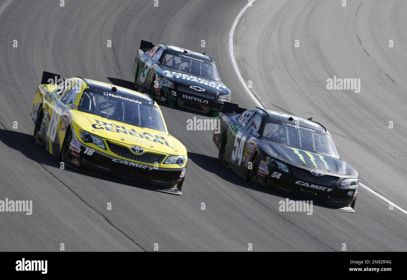 Joey Logano (18), Kyle Busch (54) and Austin Dillon (3) drive through a ...