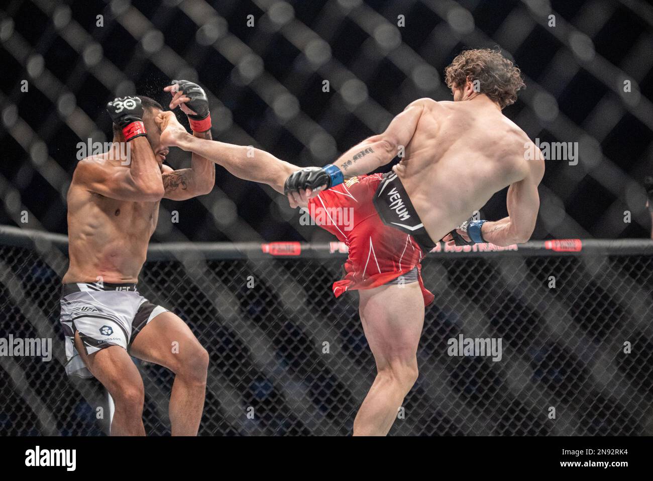 PERTH, AUSTRALIA - FEBRUARY 12: (R-L) Melsik Baghdasaryan kicks Josh ...
