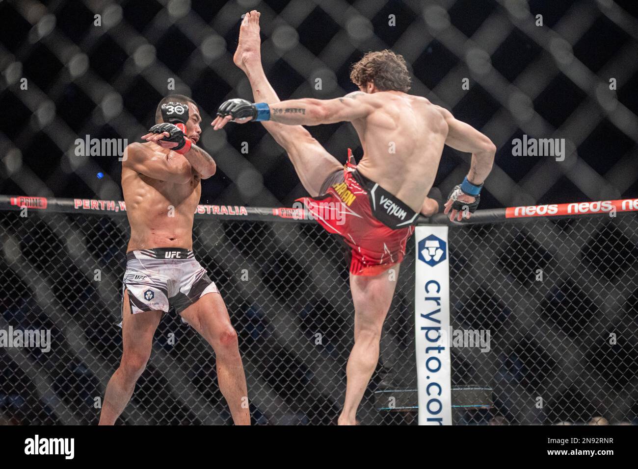 PERTH, AUSTRALIA - FEBRUARY 12: (R-L) Melsik Baghdasaryan kicks Josh ...