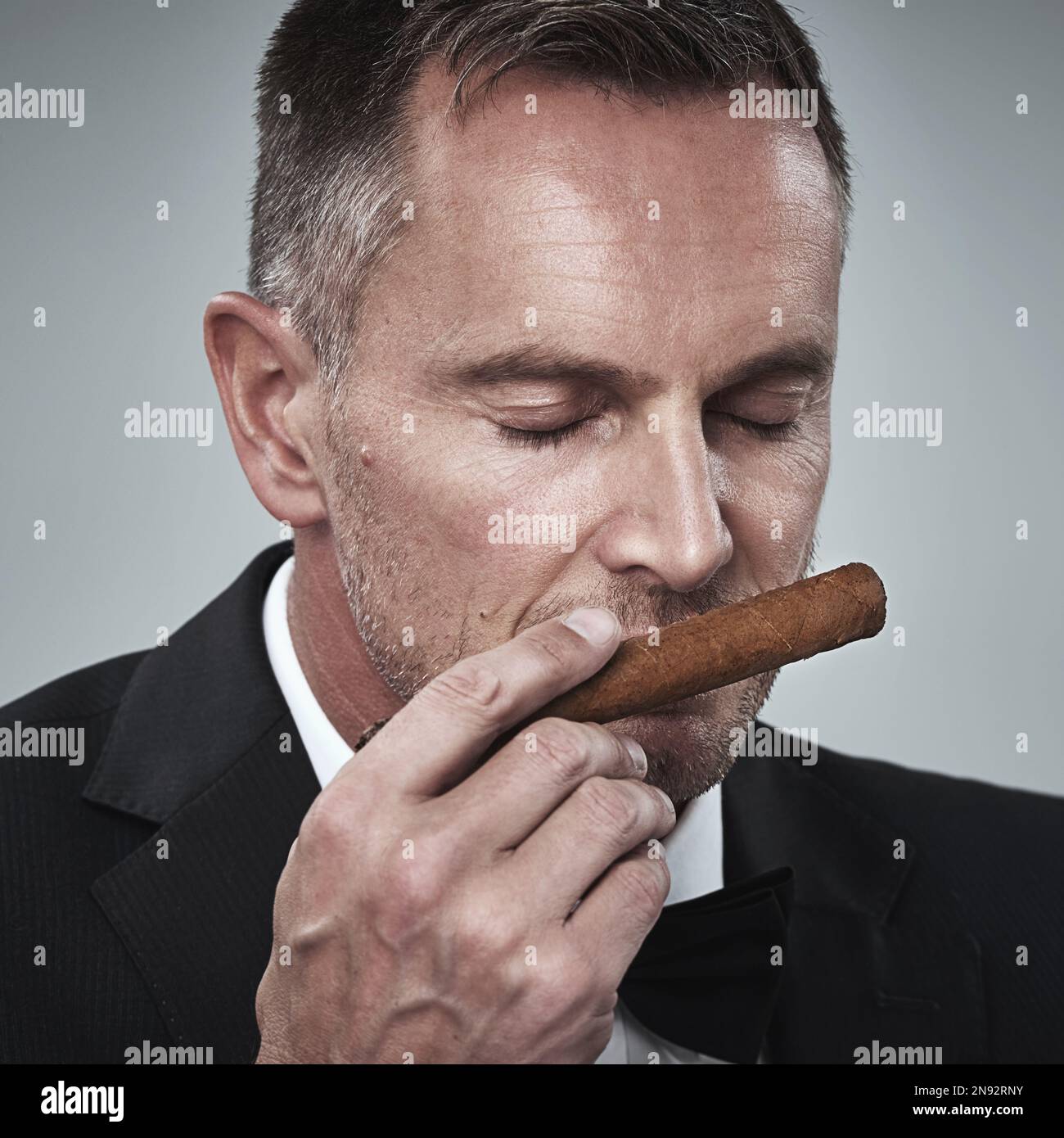 Luxury, vintage and man smell cigars for smoking habit on gray ...