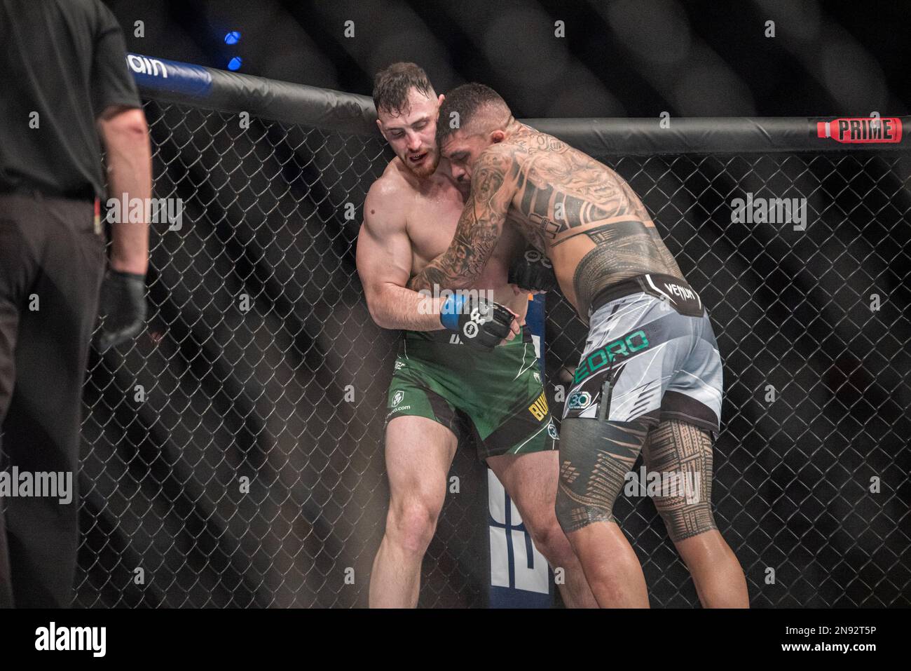 PERTH, AUSTRALIA - FEBRUARY 12: (R-L) Tyson Pedro controls the body of ...
