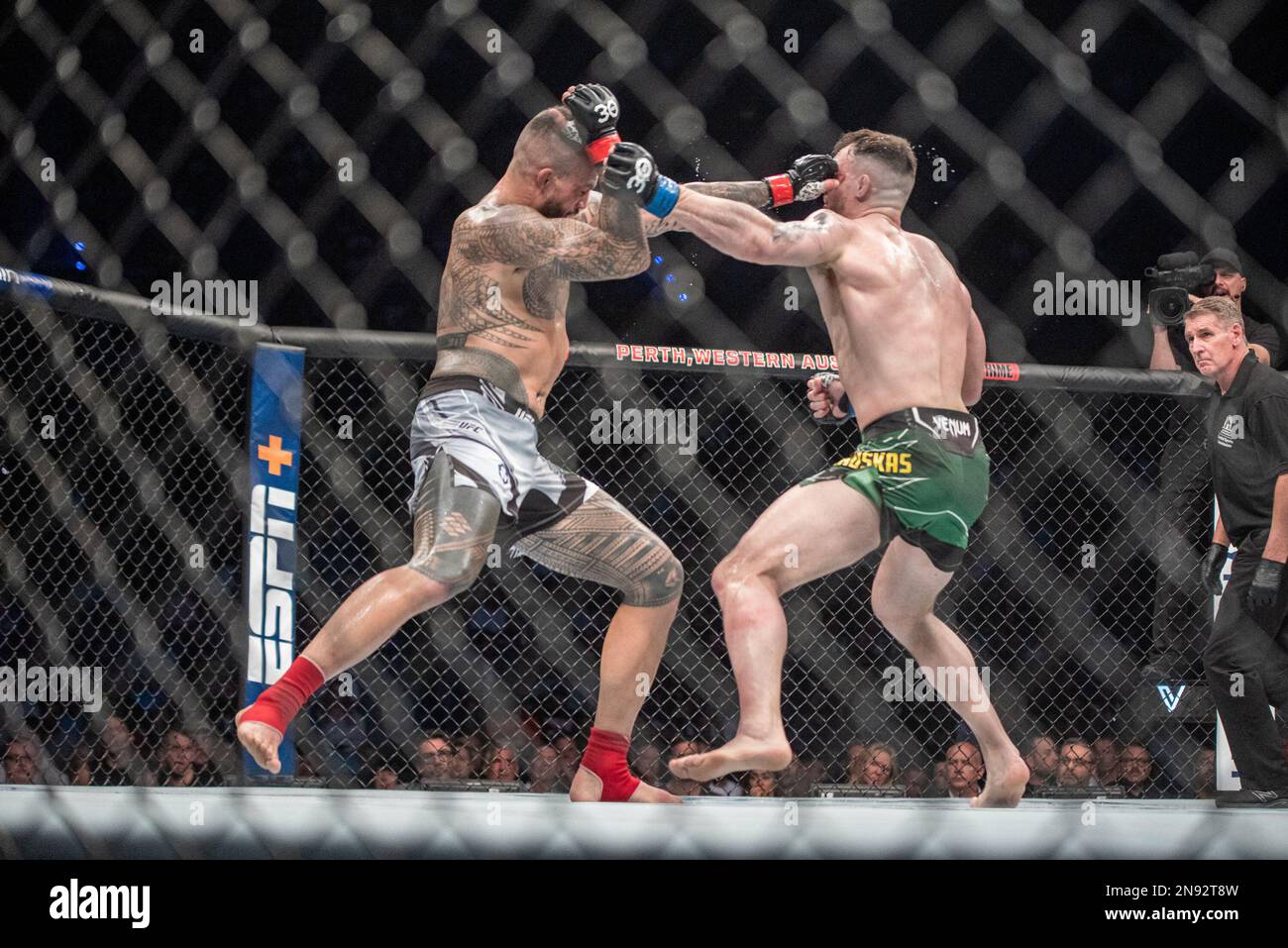 PERTH, AUSTRALIA - FEBRUARY 12: (L-R) Tyson Pedro punches Modestas ...