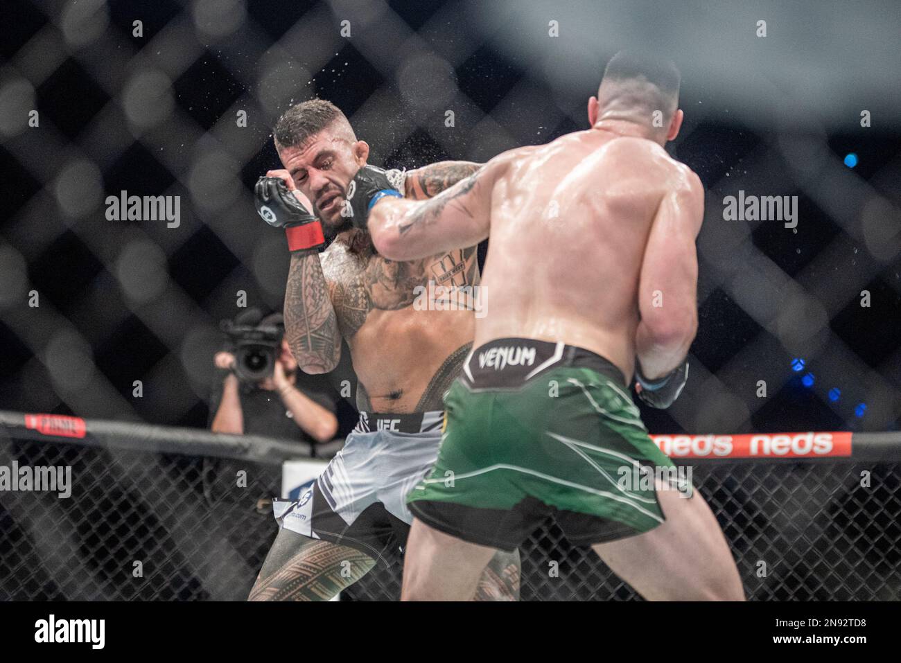 PERTH, AUSTRALIA - FEBRUARY 12: (R-L) Modestas Bukauskas punches Tyson ...