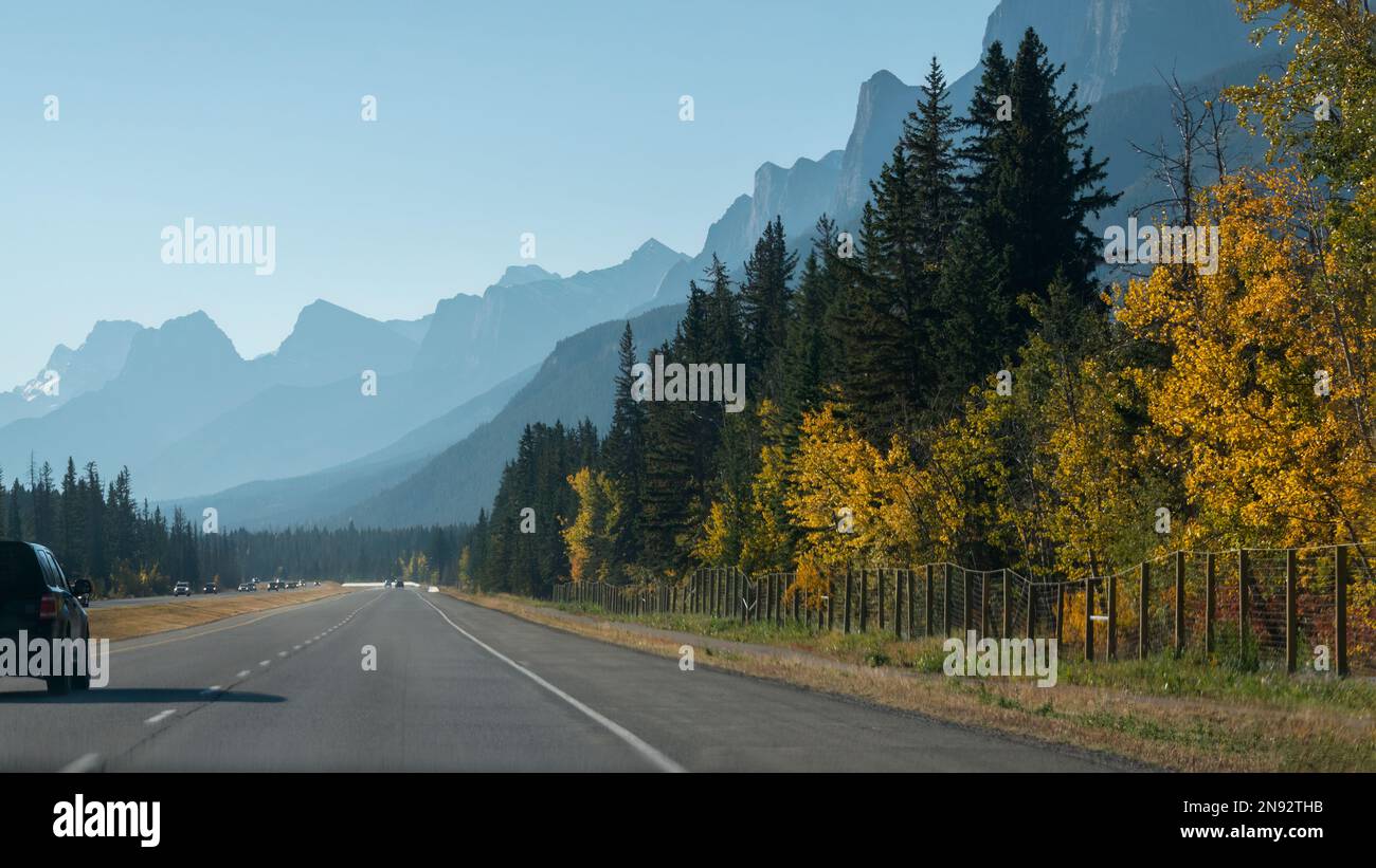 Driving on the Trans-Canada Highway in autumn, Banff National Park, Canadian Rockies Stock Photo ...