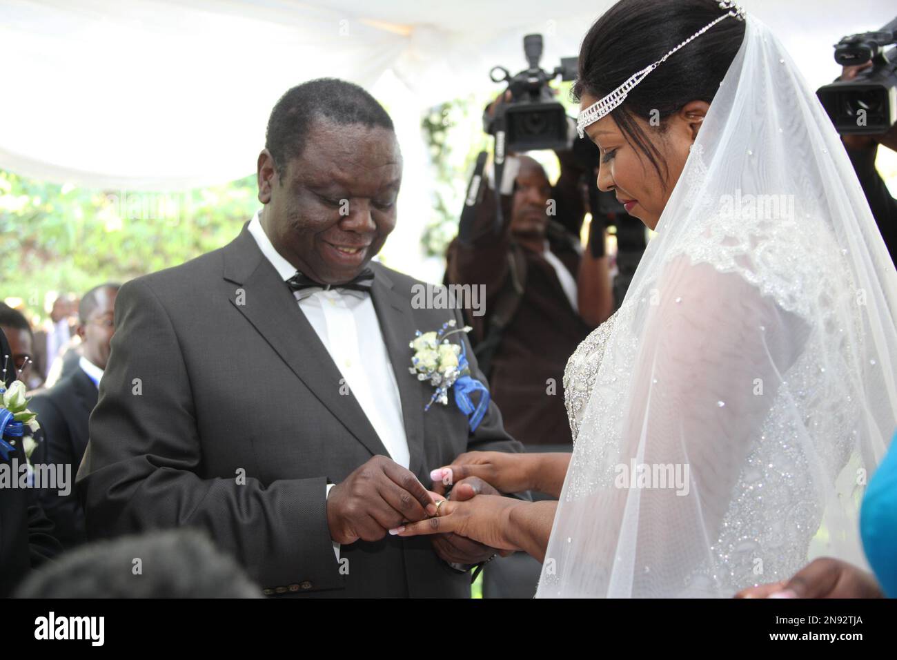 Zimbabwean Prime Minister Morgan Tsvangirai, left, is seen with his ...