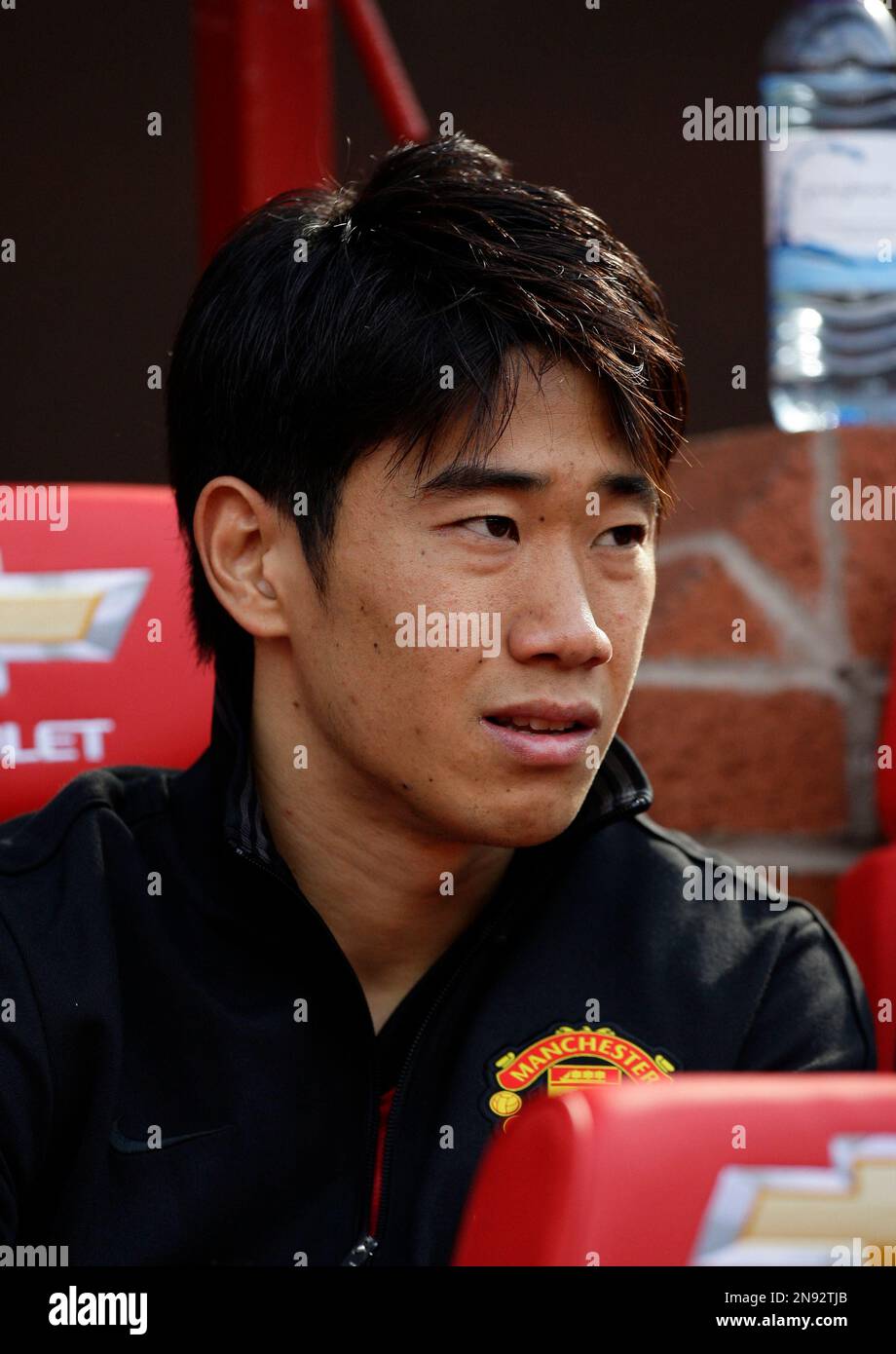 Manchester United's Shinji Kagawa sits on the substitute bench before ...