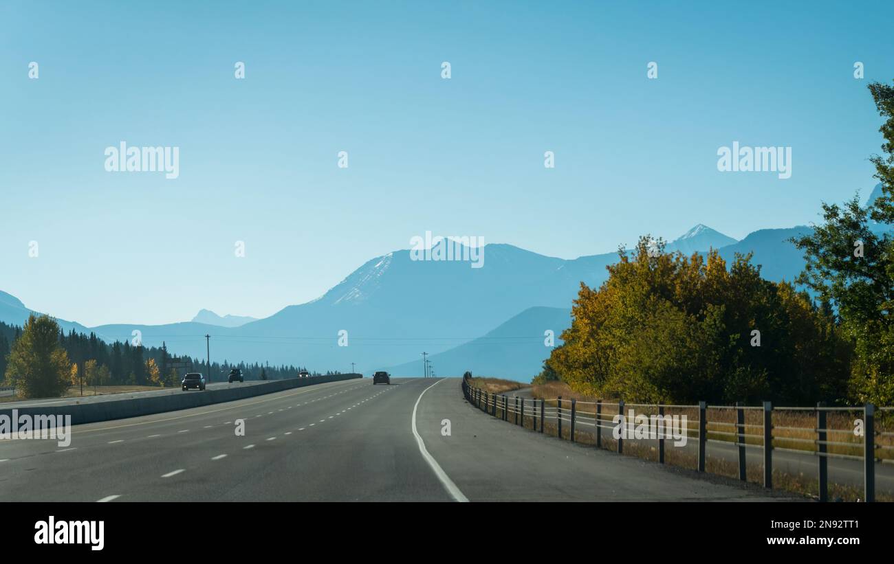 Driving on the Trans-Canada Highway in autumn, Banff National Park, Canadian Rockies Stock Photo ...