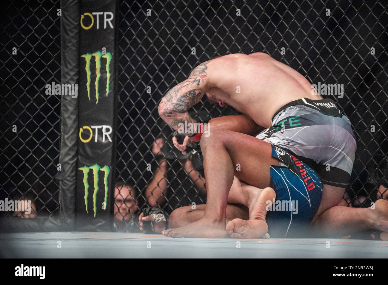 PERTH, AUSTRALIA - FEBRUARY 12: Jimmy Crute (top) attempts to submit ...
