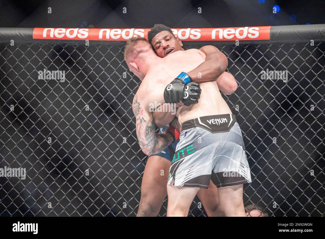 PERTH, AUSTRALIA - FEBRUARY 12:(R-L) Jimmy Crute controls the body of ...