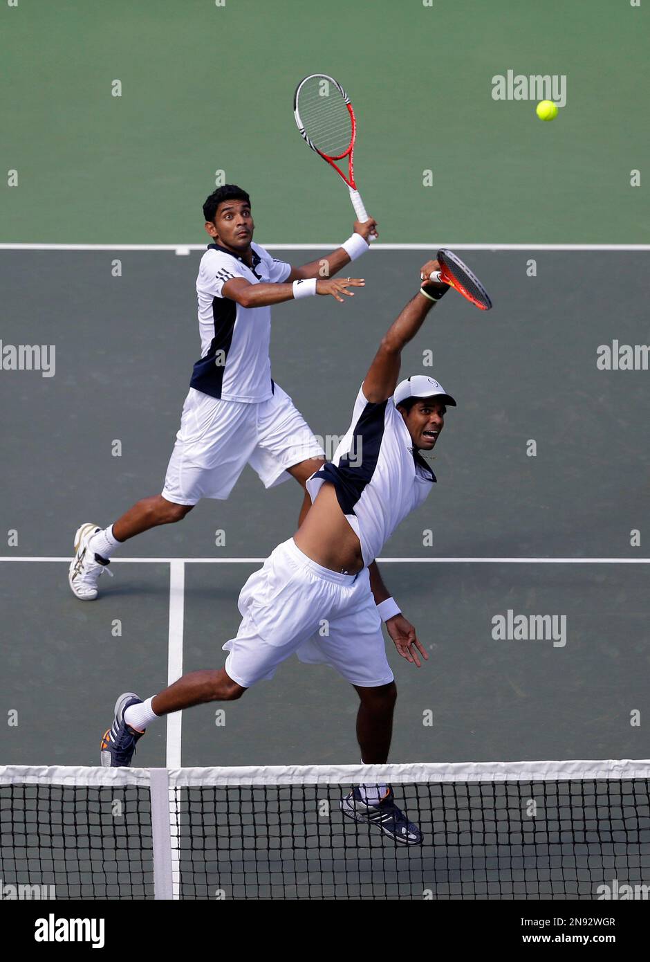 India's Vishnu Vardhan, right, and Divij Sharan play against New Zealand's Daniel King-Turner ...