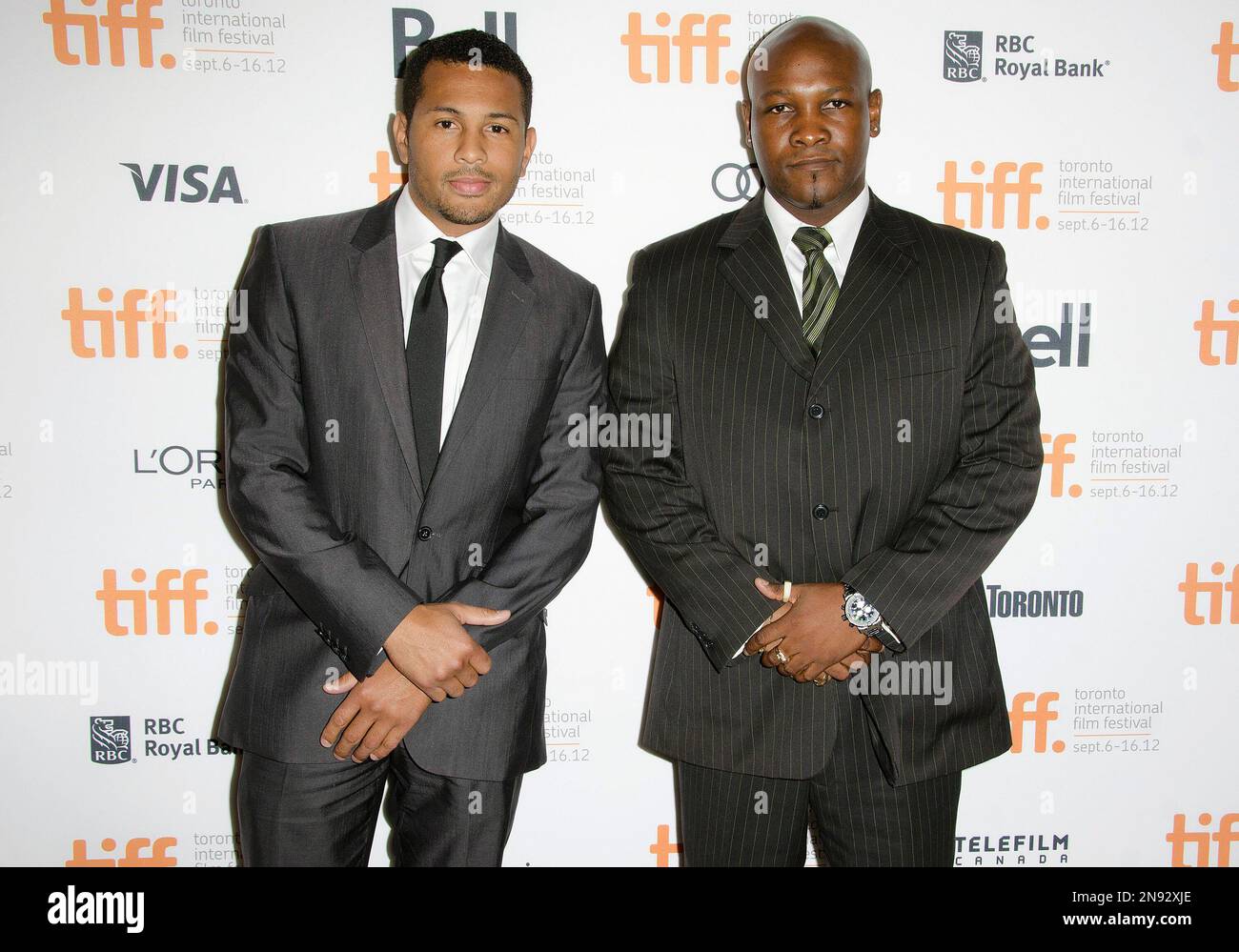 Actors Mizinga Mwinga and Alain Bastien arrive at the premiere for the ...
