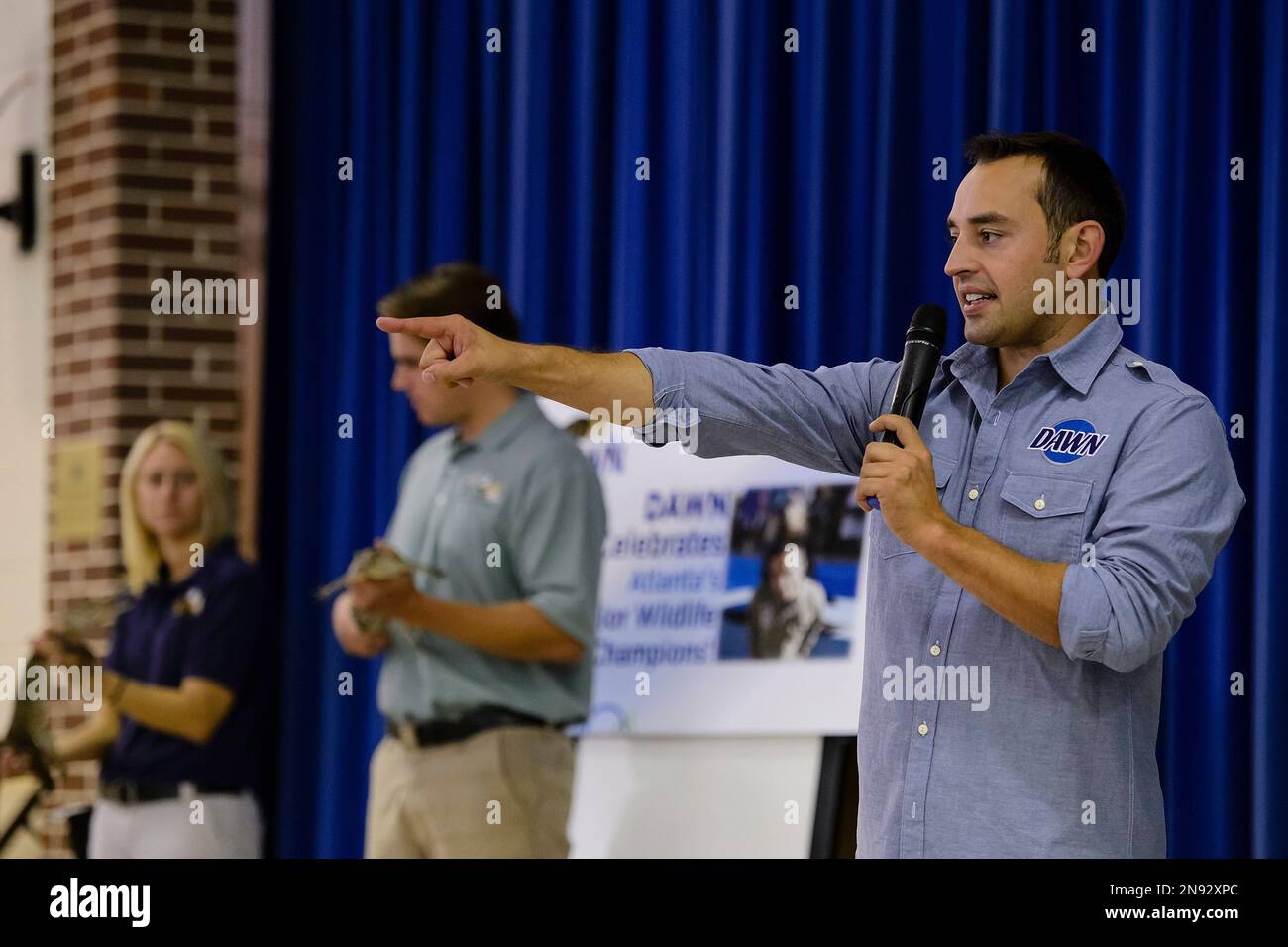 Zoologist Jarod Miller introduces a crocodile and alligator to the Dawn ...