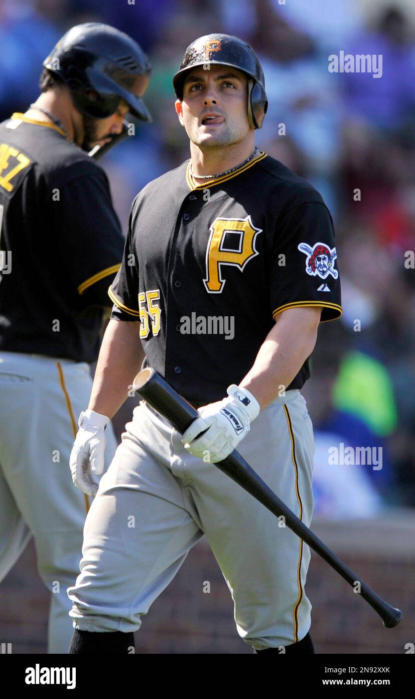 Pittsburgh Pirates' Michael McKenry heads to the dugout after striking ...