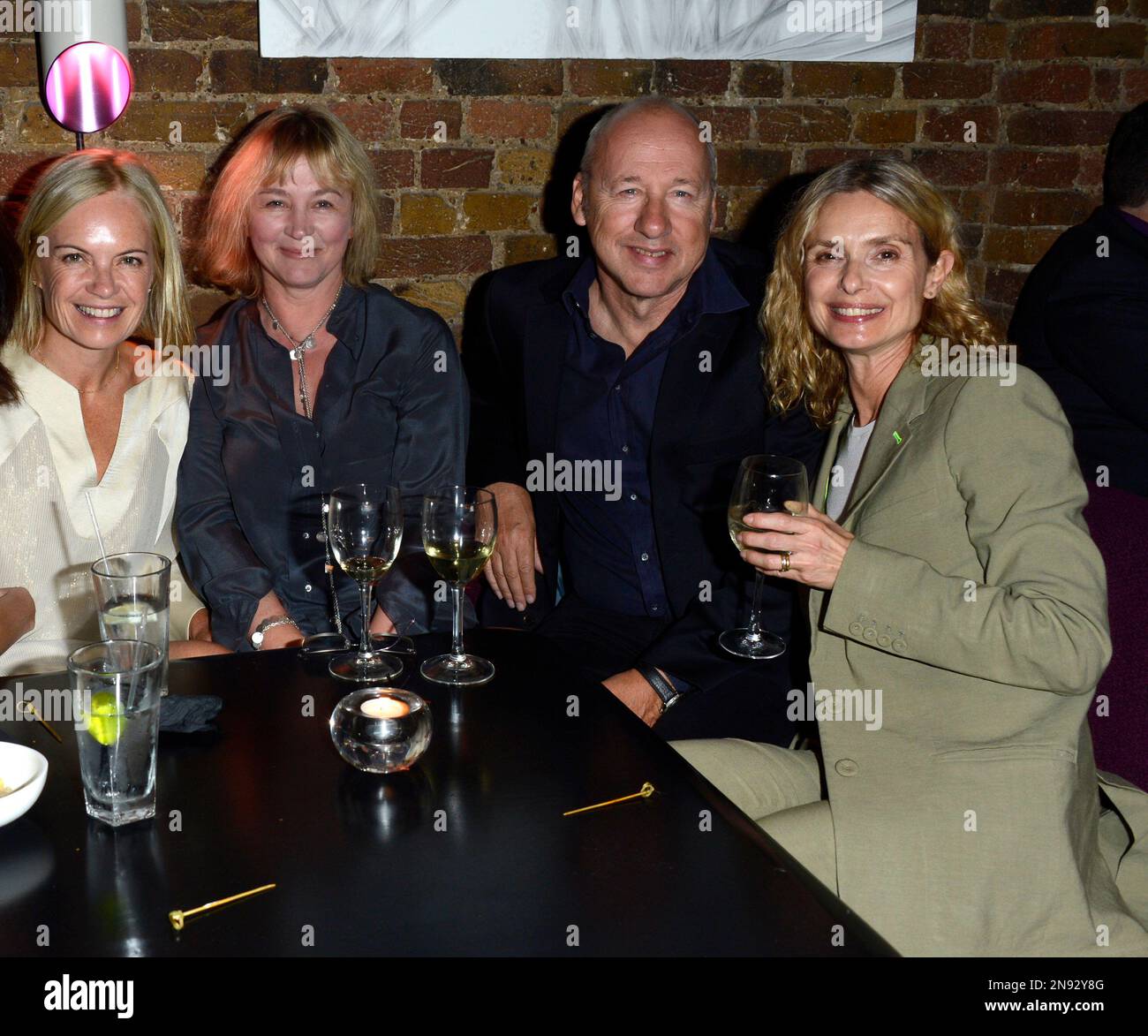 Mariella Frostrup, Kitty Aldridge, Mark Knopfler, Miriam D'Arbo poses ...