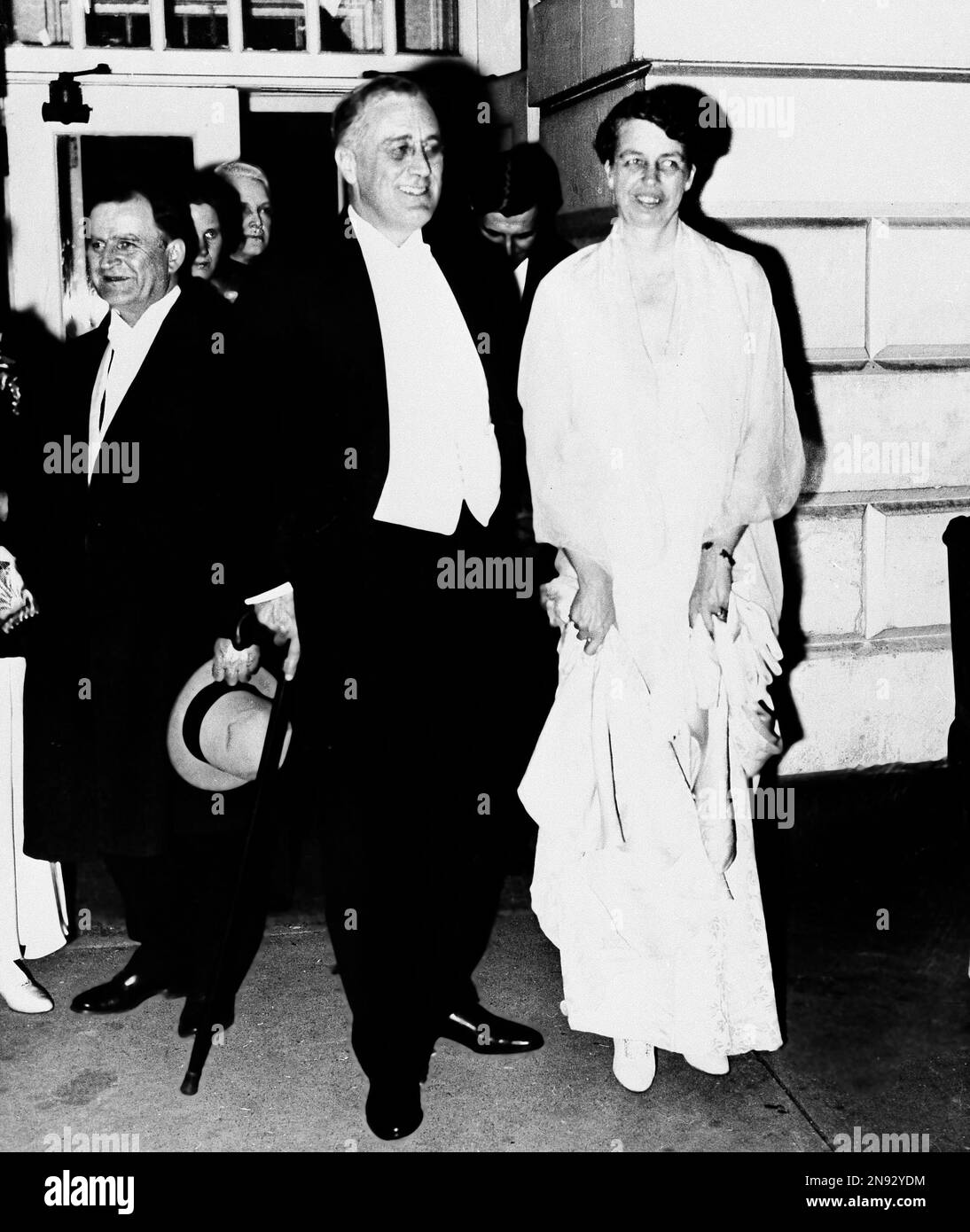 Franklin D. Roosevelt and his wife Eleanor are seen outside what may be ...