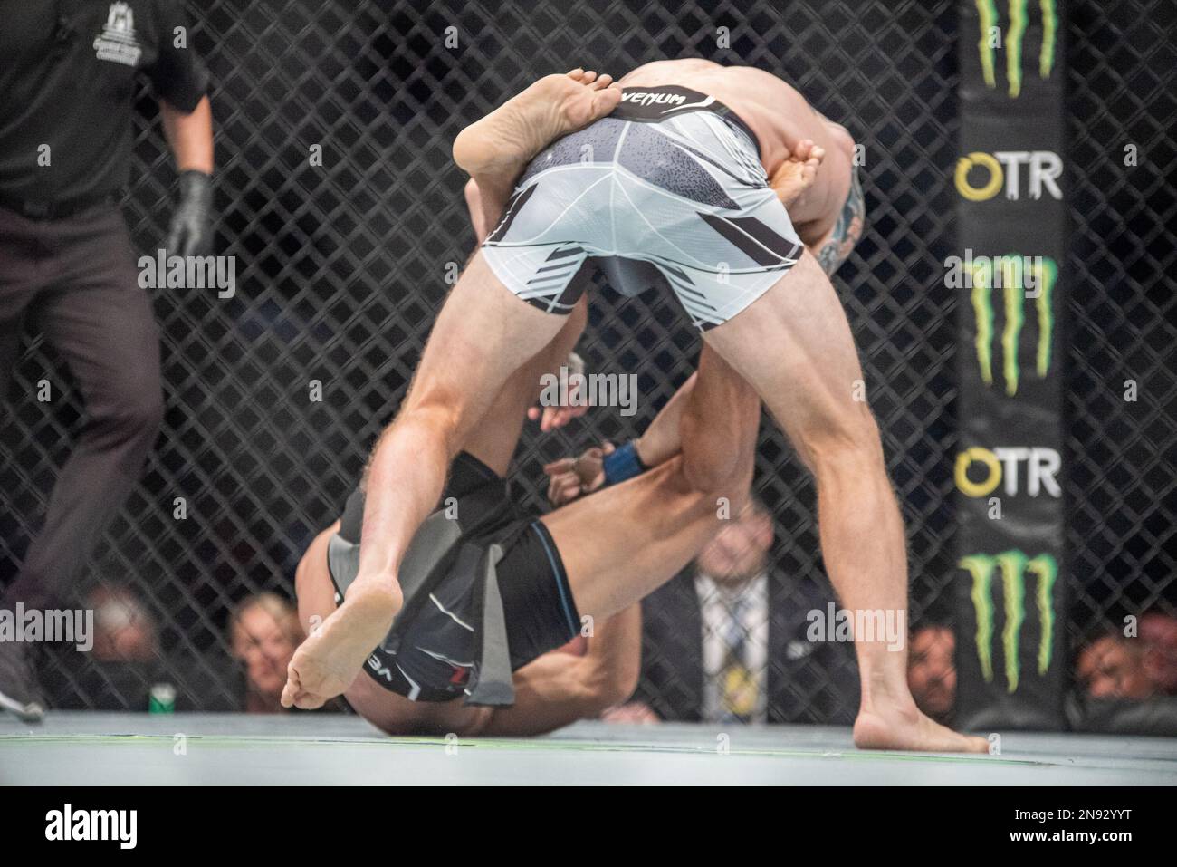 PERTH, AUSTRALIA - FEBRUARY 12: (R-L) Josh Emmett controls the body of ...