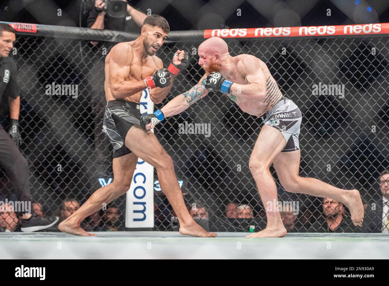 PERTH, AUSTRALIA - FEBRUARY 12: (R-L) Josh Emmett punches Yair ...