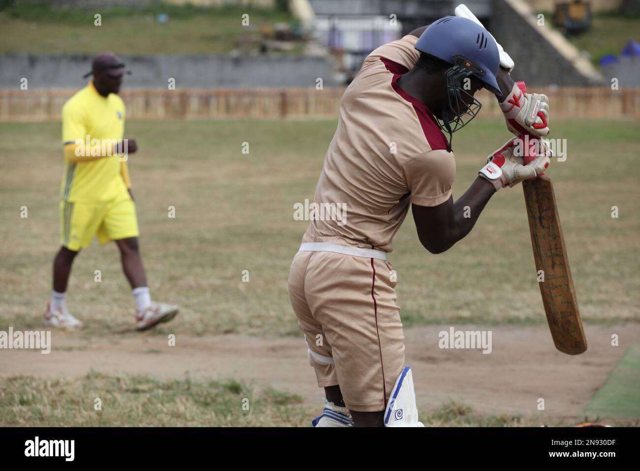 Men practice cricket at Tafawa Balewa Square in Lagos, Nigeria, Friday ...