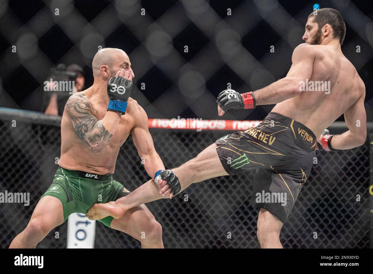 PERTH, AUSTRALIA - FEBRUARY 12: (R-L) Islam Makhachev kicks Alex ...