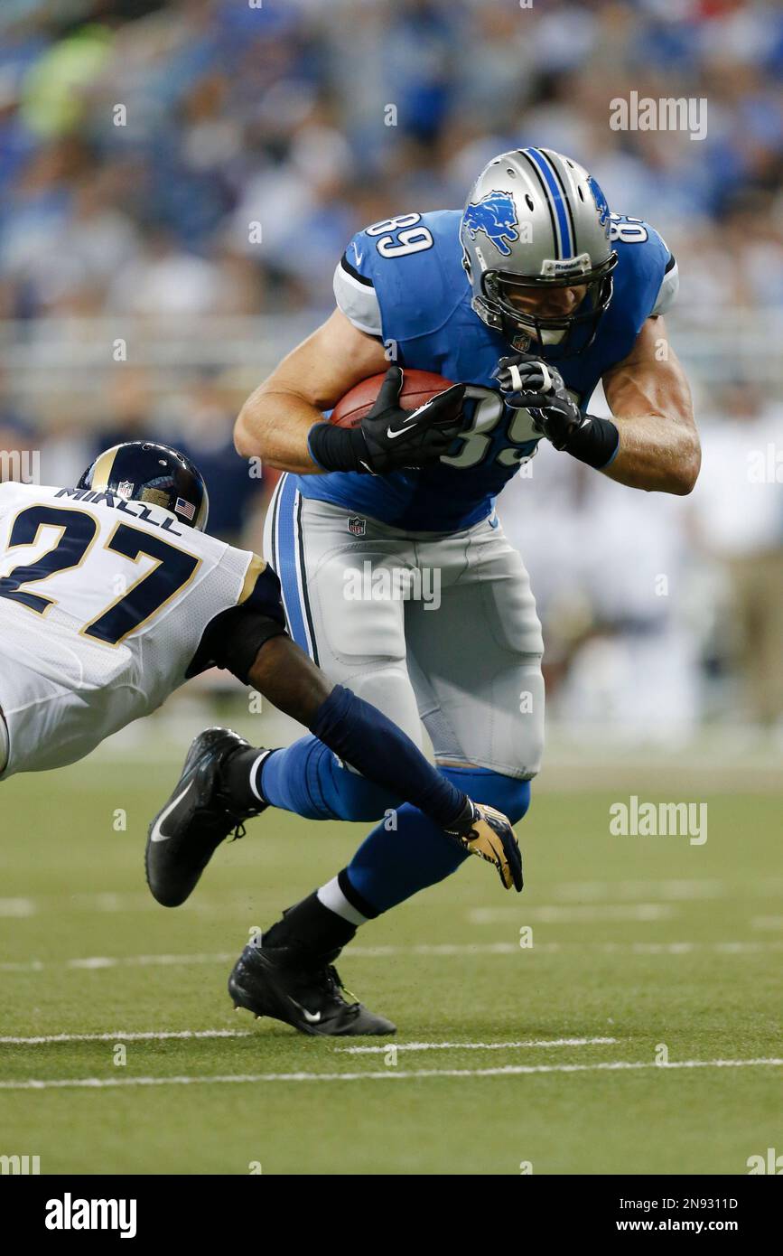 Detroit Lions tight end Will Heller (89) is tripped up by St. Louis ...