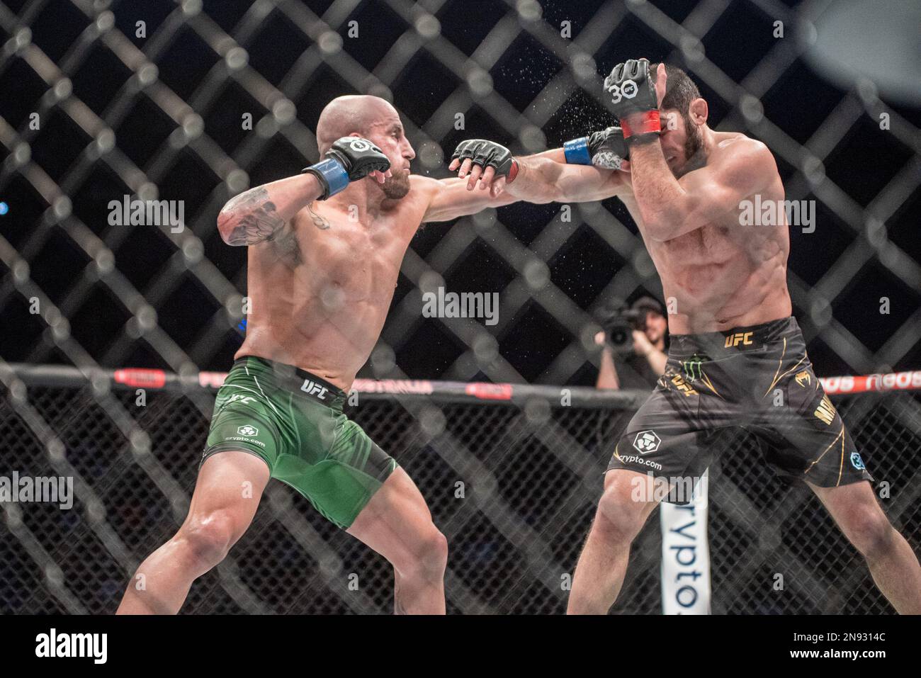 PERTH, AUSTRALIA - FEBRUARY 12: (L-R) Alex Volkanovski punches Islam ...