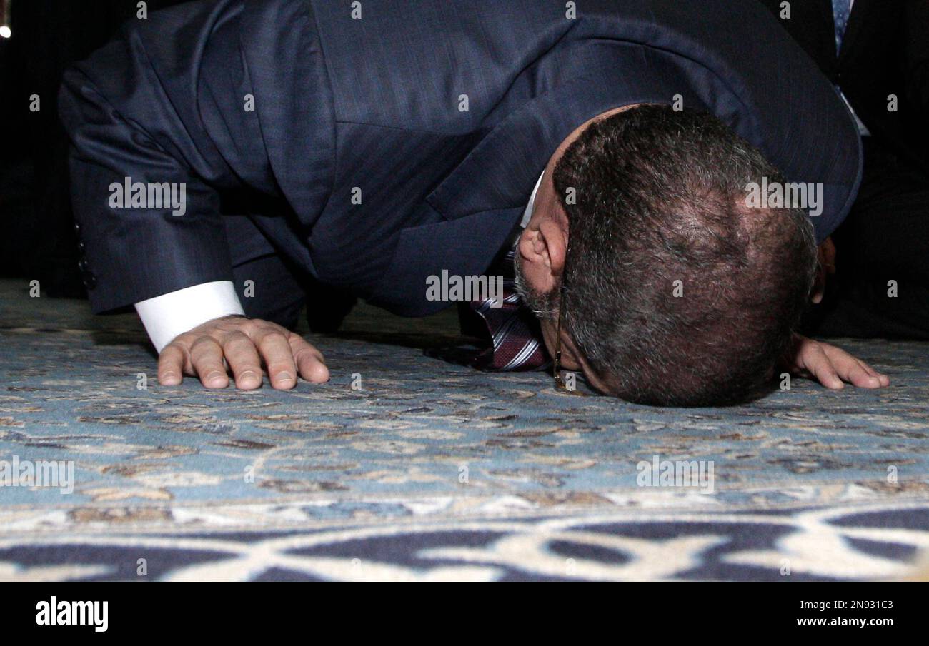 Egyptian President Mohammed Morsi prays inside the Great Mosque in Rome ...