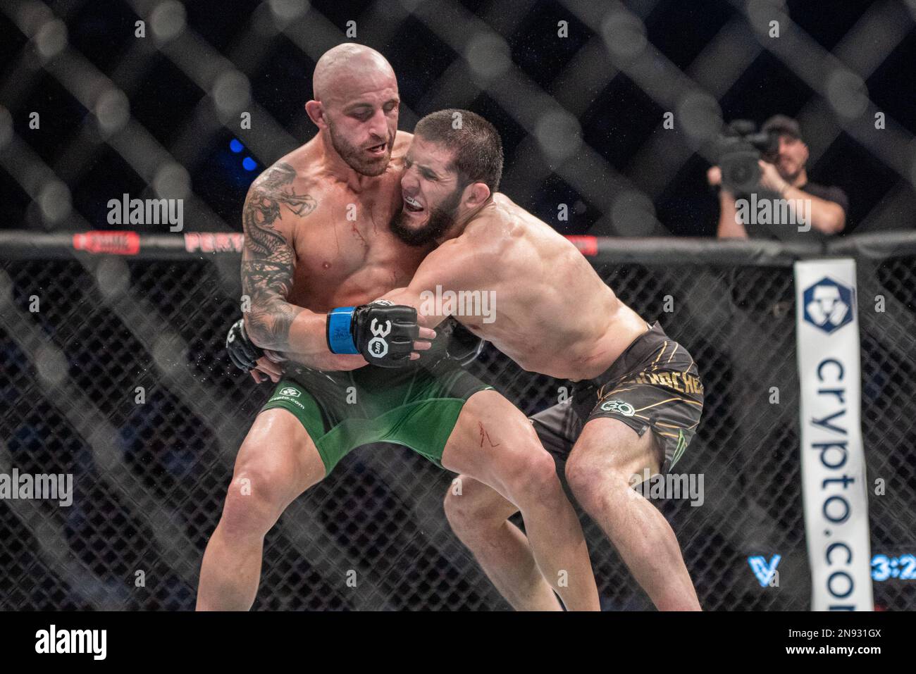 PERTH, AUSTRALIA - FEBRUARY 12: (R-L) Islam Makhachev controls the body ...