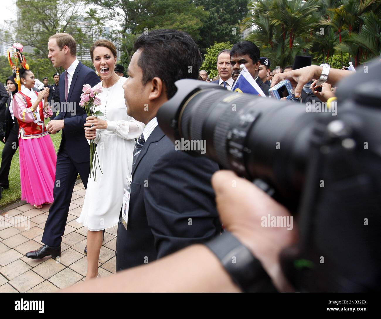 Britain's Prince William, left, and his wife Kate, the Duke and the ...