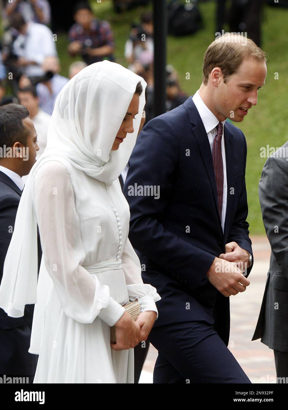Britain's Prince William, right, and his wife Kate, the Duke and the ...