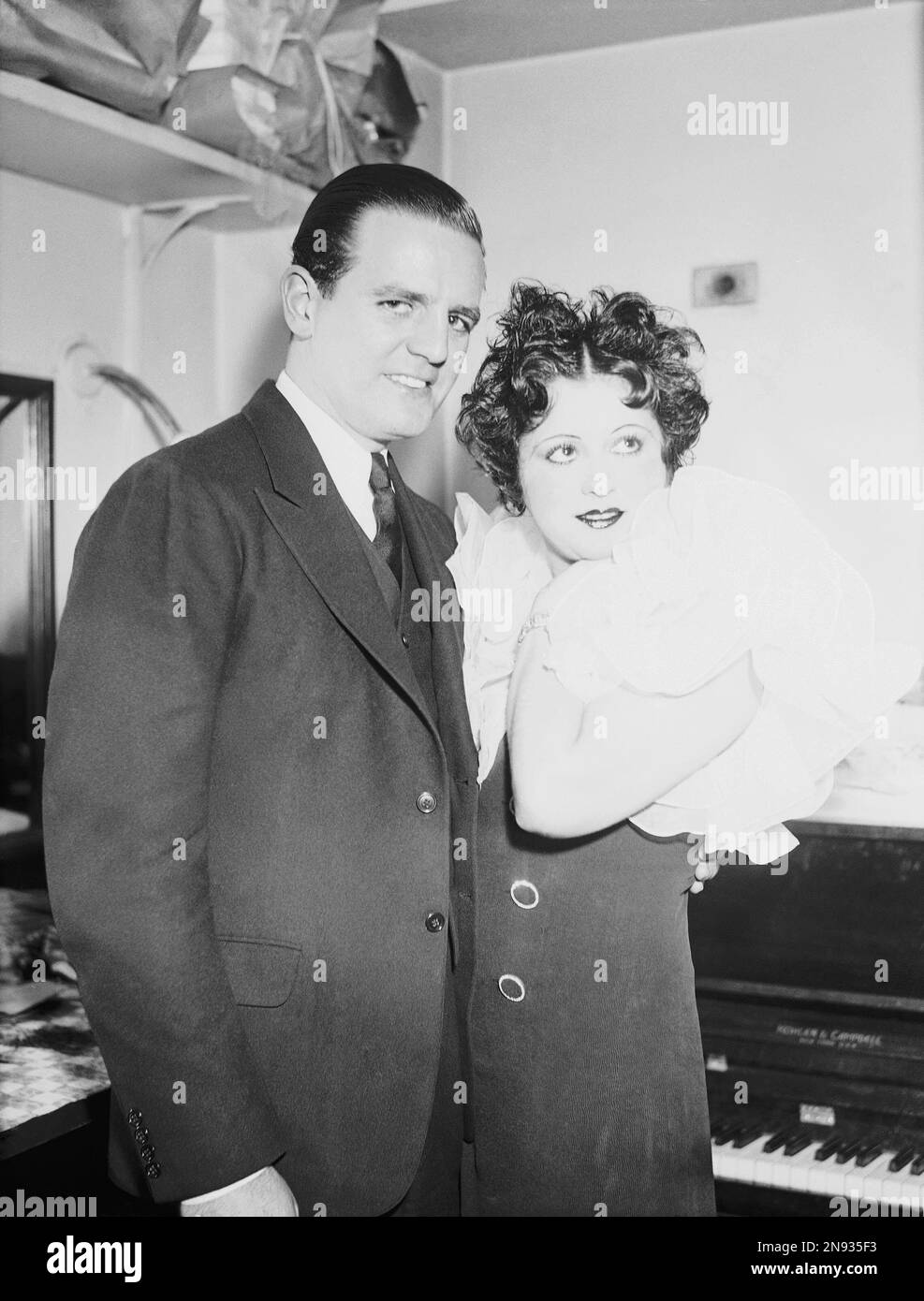 Helen Kane, stage and screen star, is shown with movie actor Max ...