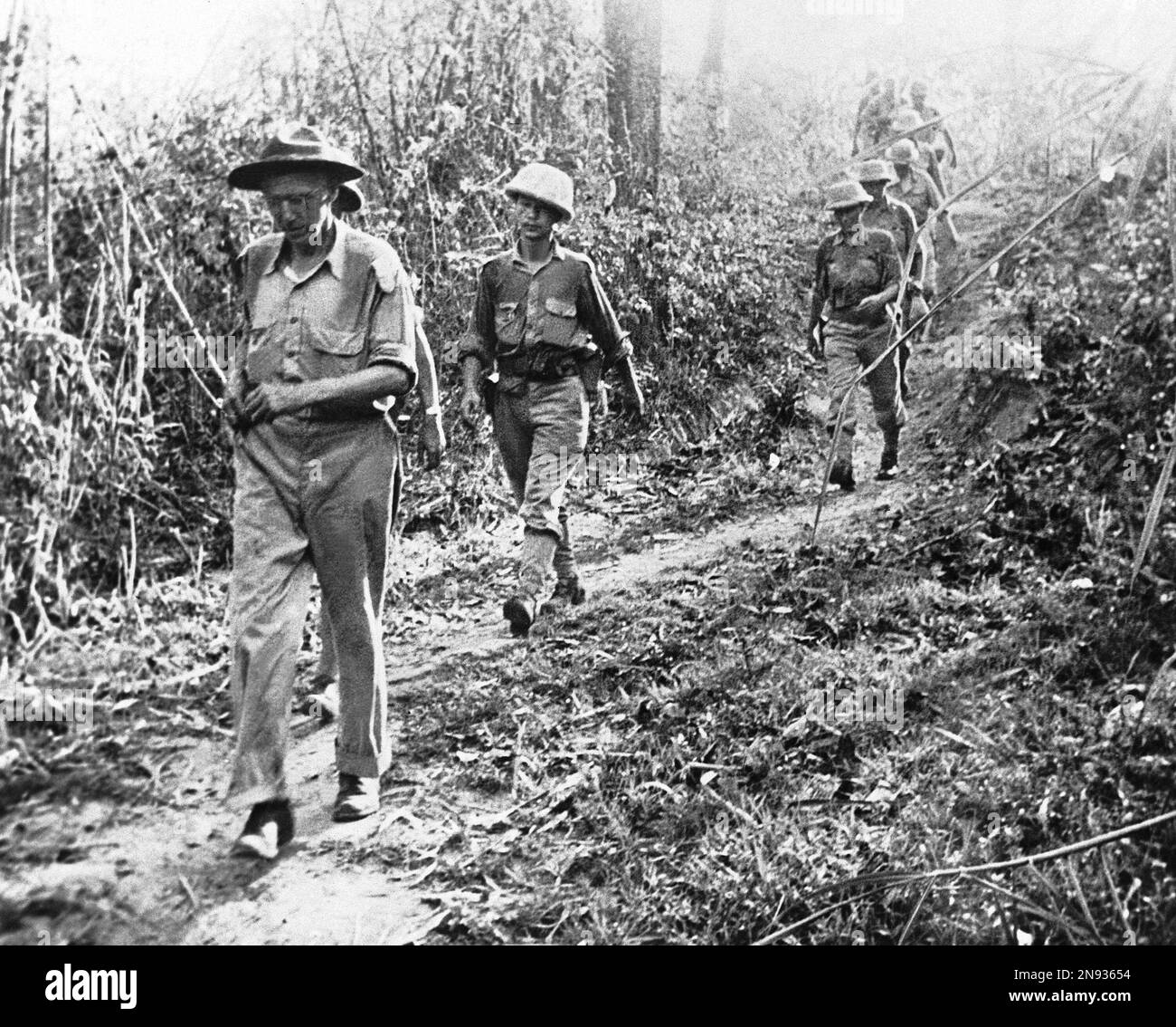 The general leading his band, which included 114 Americans, Burmese ...