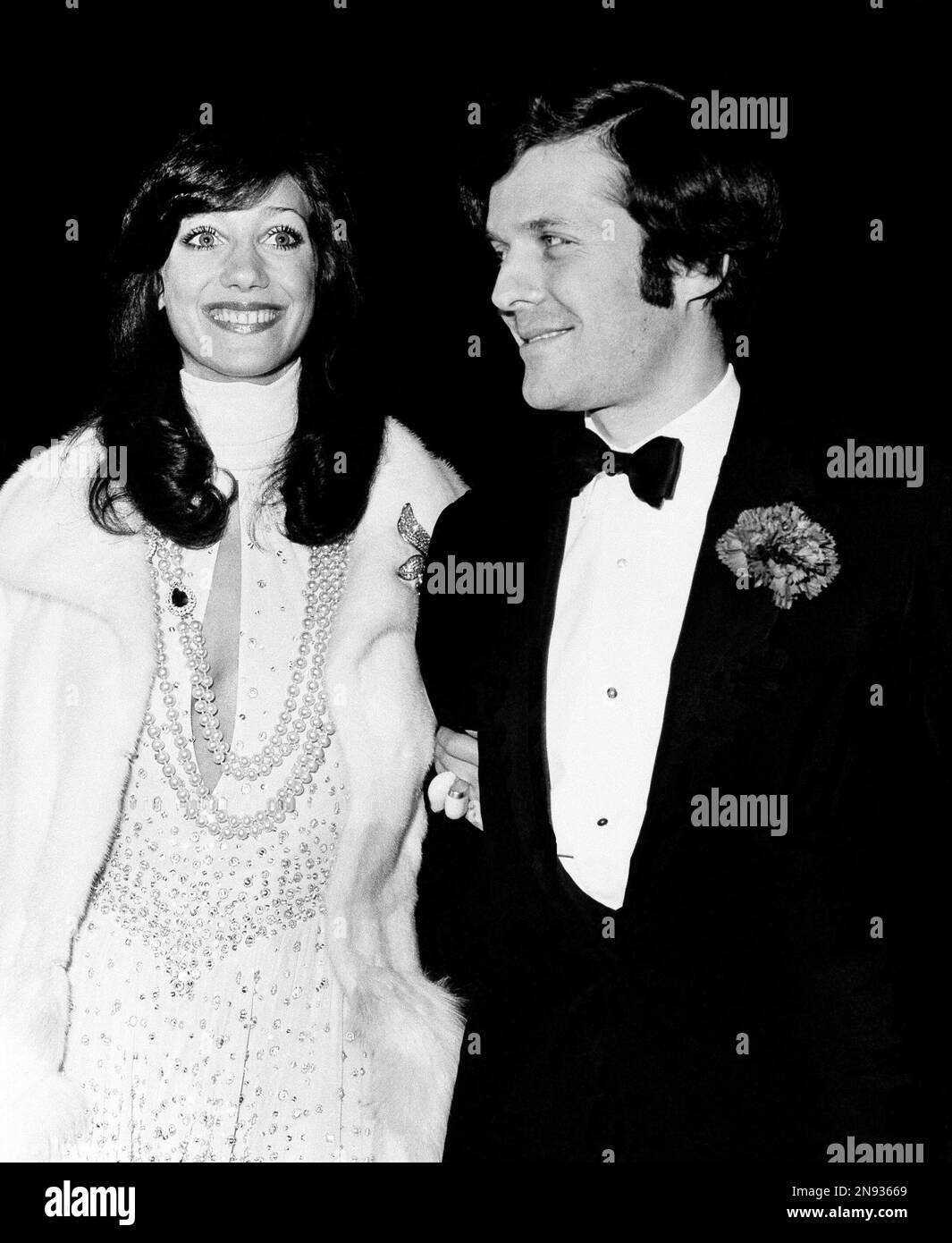 Marisa Berenson, one of the stars of "Cabaret," is escorted by David de ...