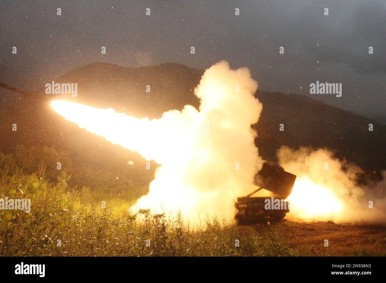 A rocket is fired into the air from a U.S. Multiple Launch Rocket ...