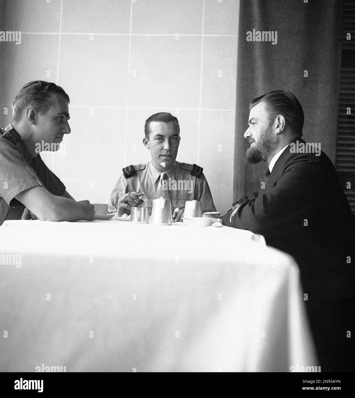 Harry Crockett, center, and AP photographer Weston Haynes, right, are ...