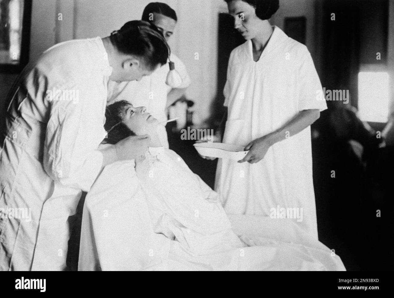 Fanny Brice with Dr. Henry Schireson, plastic surgeon viewing her nose ...
