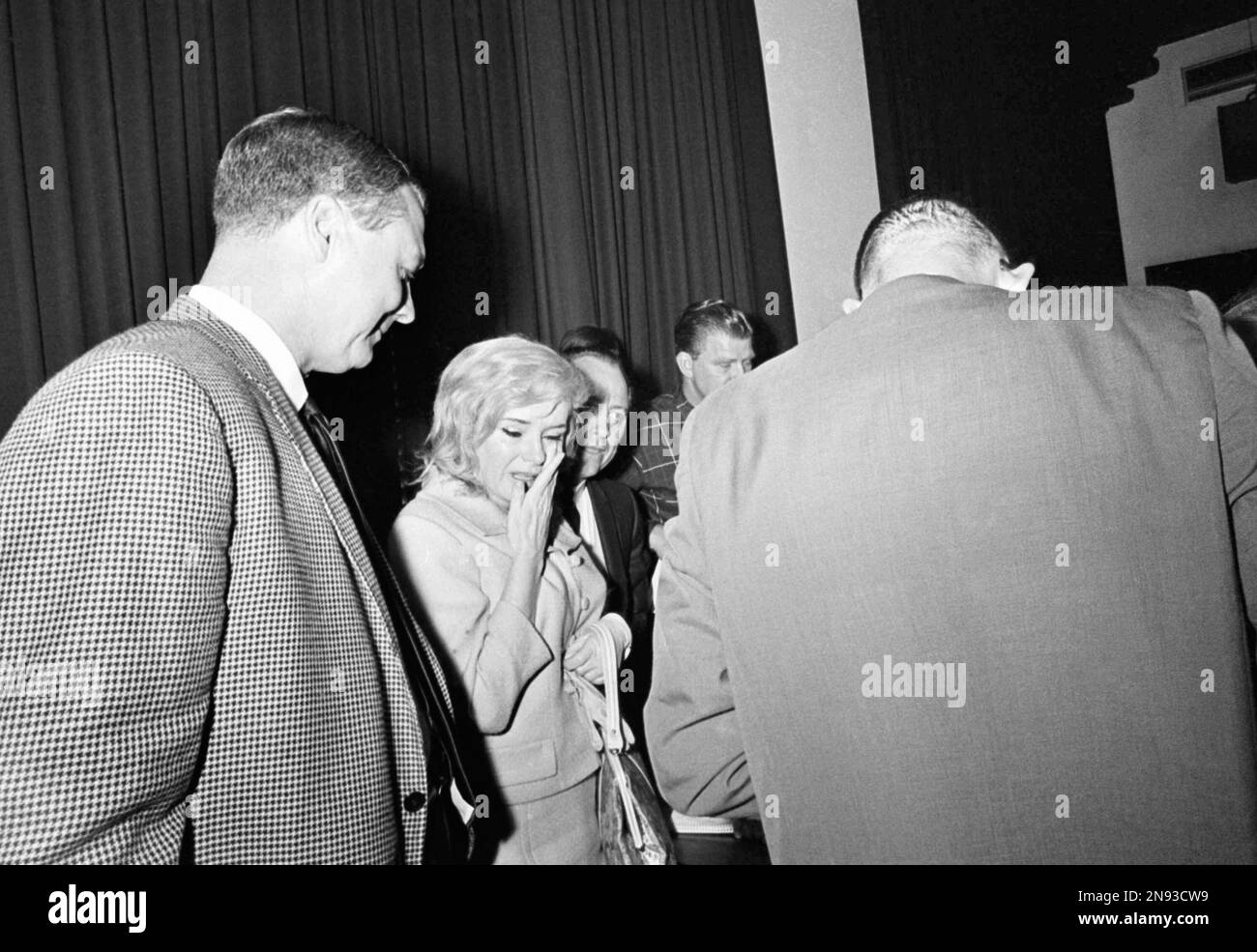 Candace Mossler wipes away tears in the courtroom in Miami, Fla. March ...