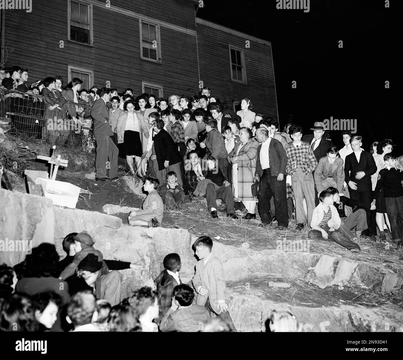 9-year-old Bronx boy, Joseph Vitolo, kneels in prayer before crude ...