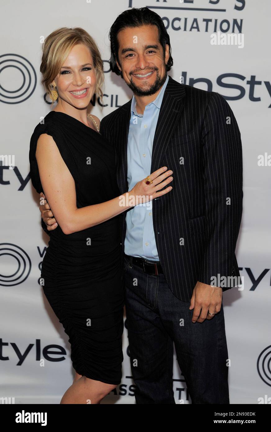 Actress Julie Benz and her husband Rich Orosco pose together at the ...