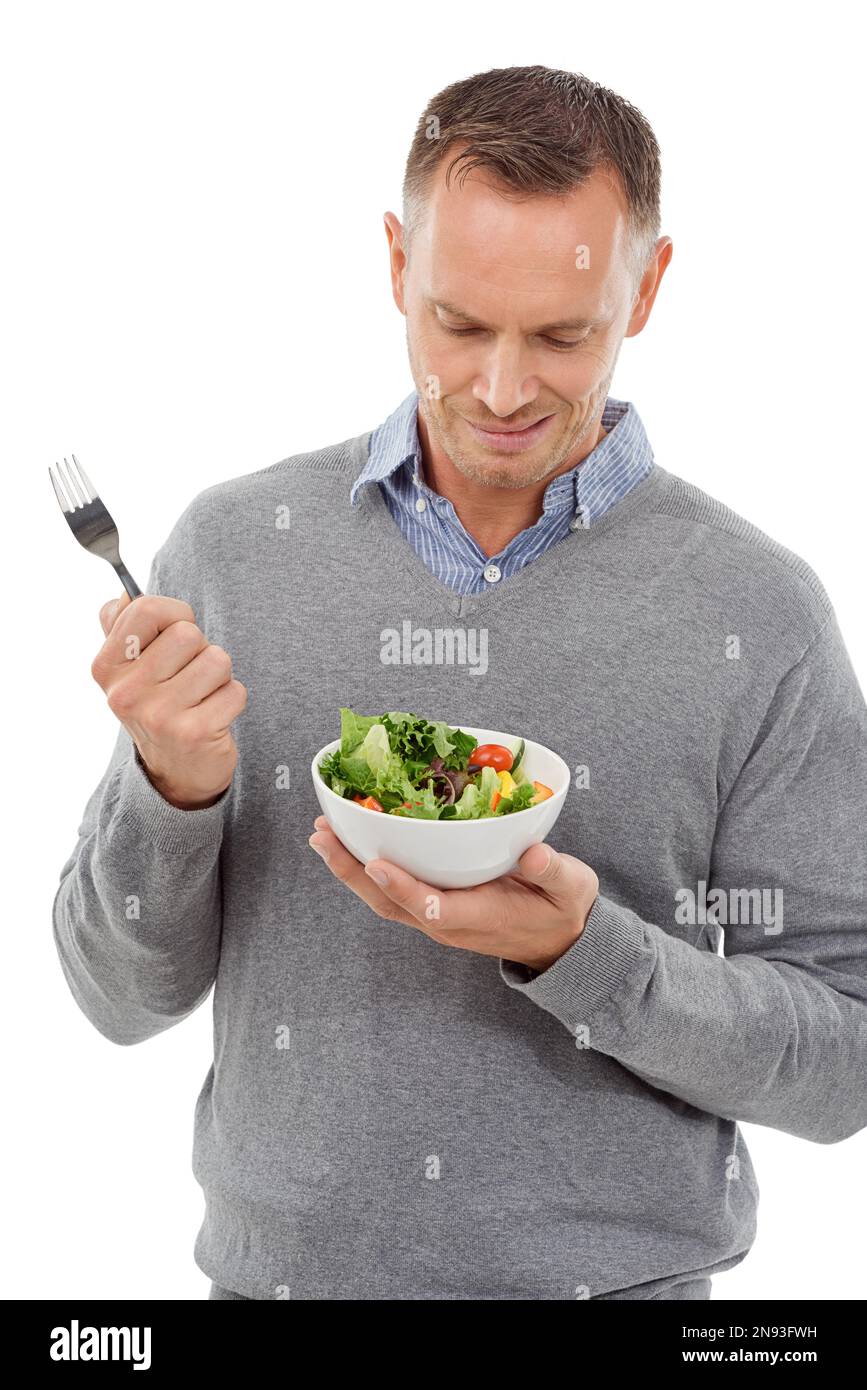 Man with salad, frown on face and vegetable, problem with healthy ...