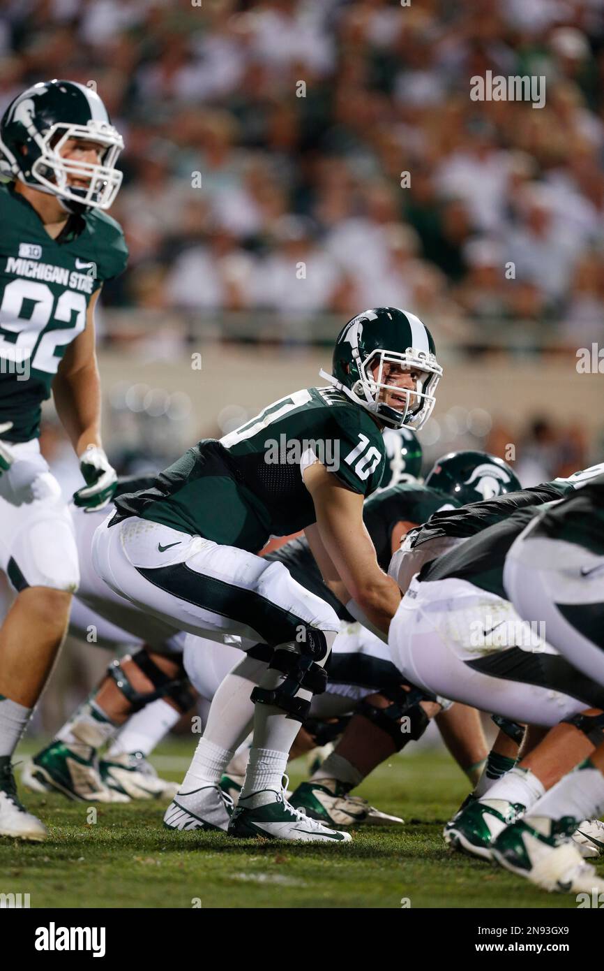 Michigan State quarterback Andrew Maxwell (10) is shown under center ...