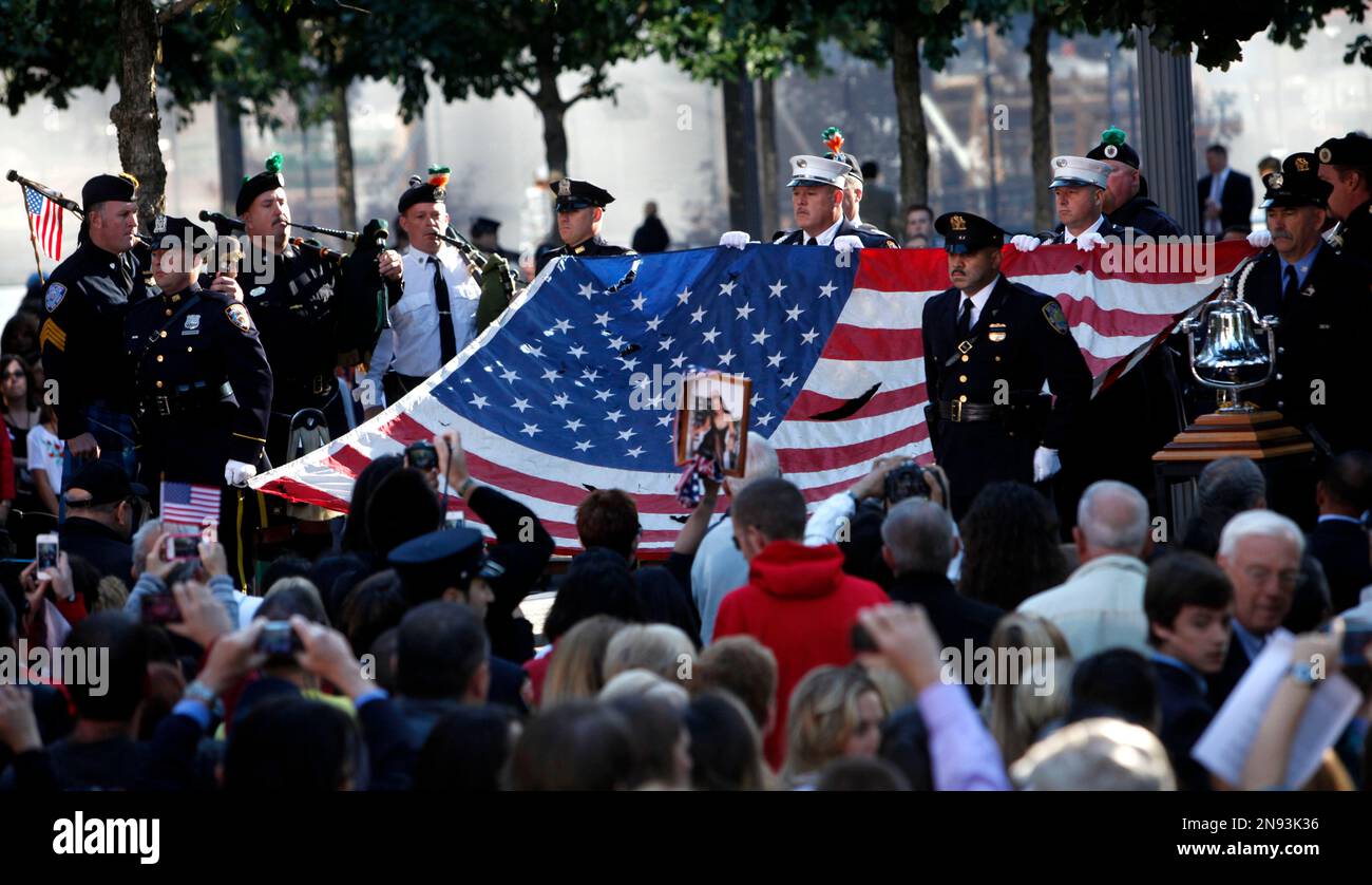 The World Trade Center Flag is presented as friends and relatives of ...