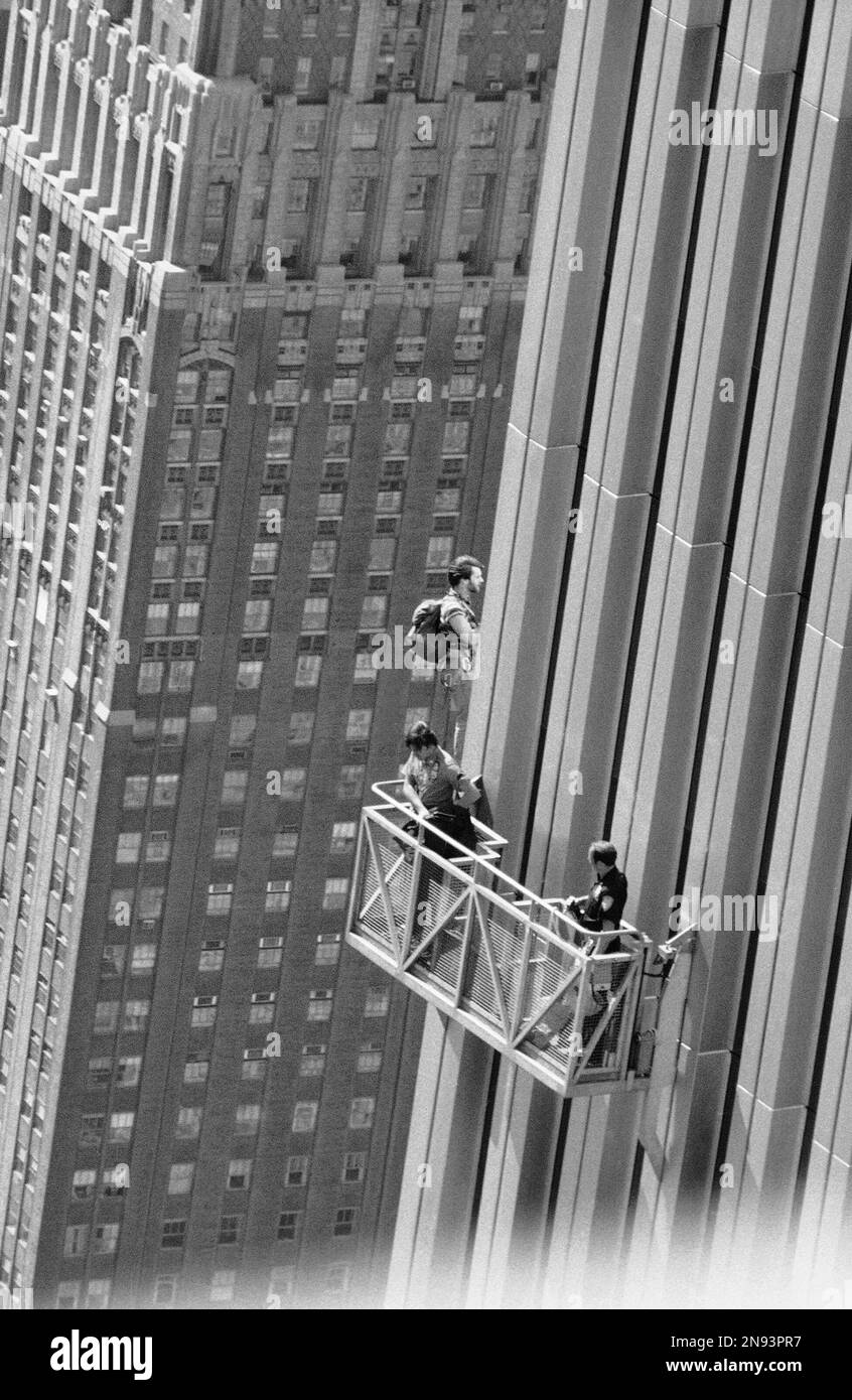 George Willig scales the World Trade Center tower as police follow him ...